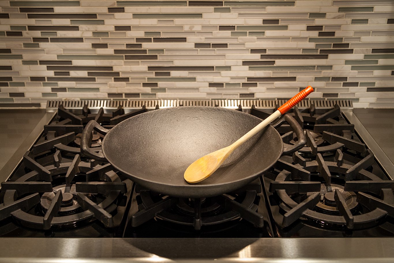 It's useful. 14 Inch Cast Iron Wok with Handles and Built in Base