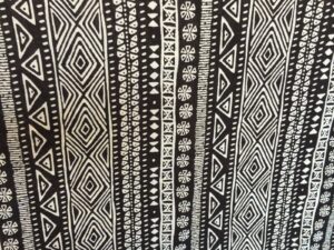 100% rayon challis aboriginal inspired print w off white n black fabric