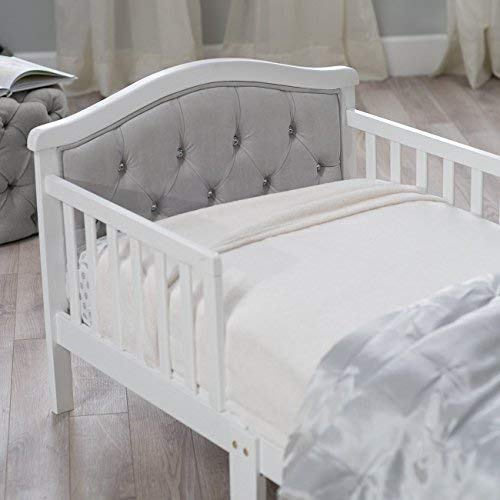 Orbelle Padded and upholstered Head and Footboard Upholstery is Ultra-Soft Micro-Fiber Polyester Decorative Crystal Dimensions: 53L x 30W x 27H in White Finish Fits a Standard Crib Mattress