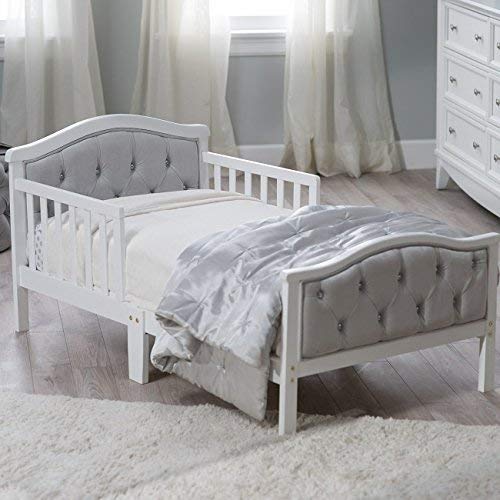 Orbelle Padded and upholstered Head and Footboard Upholstery is Ultra-Soft Micro-Fiber Polyester Decorative Crystal Dimensions: 53L x 30W x 27H in White Finish Fits a Standard Crib Mattress