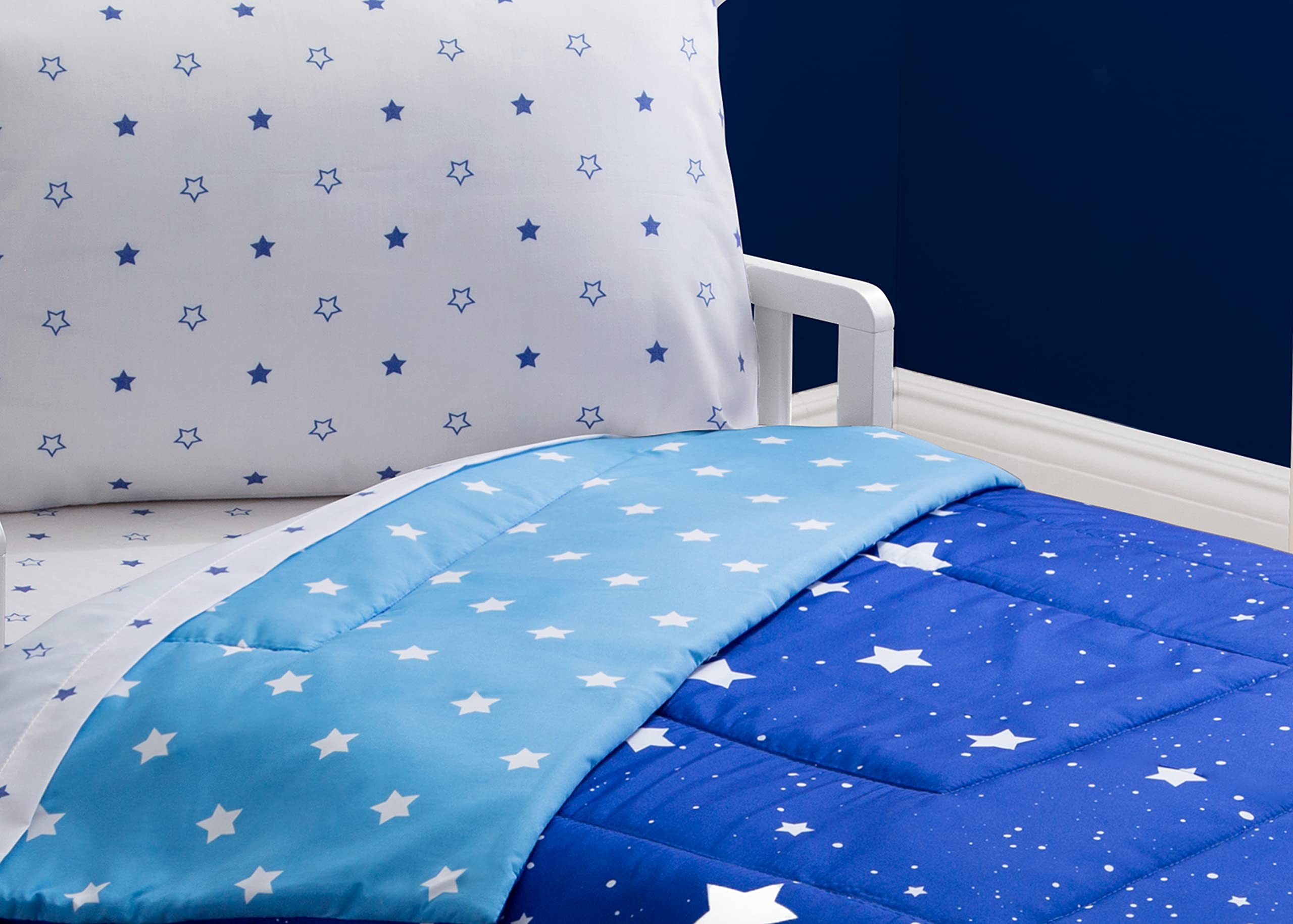 Delta Children 4 Piece Toddler Bedding Set for Boys - Reversible 2-in-1 Comforter - Includes Fitted Comforter to Keep Little Ones Snug, Bottom Sheet, Top Sheet, Pillow Case - Blue Stars