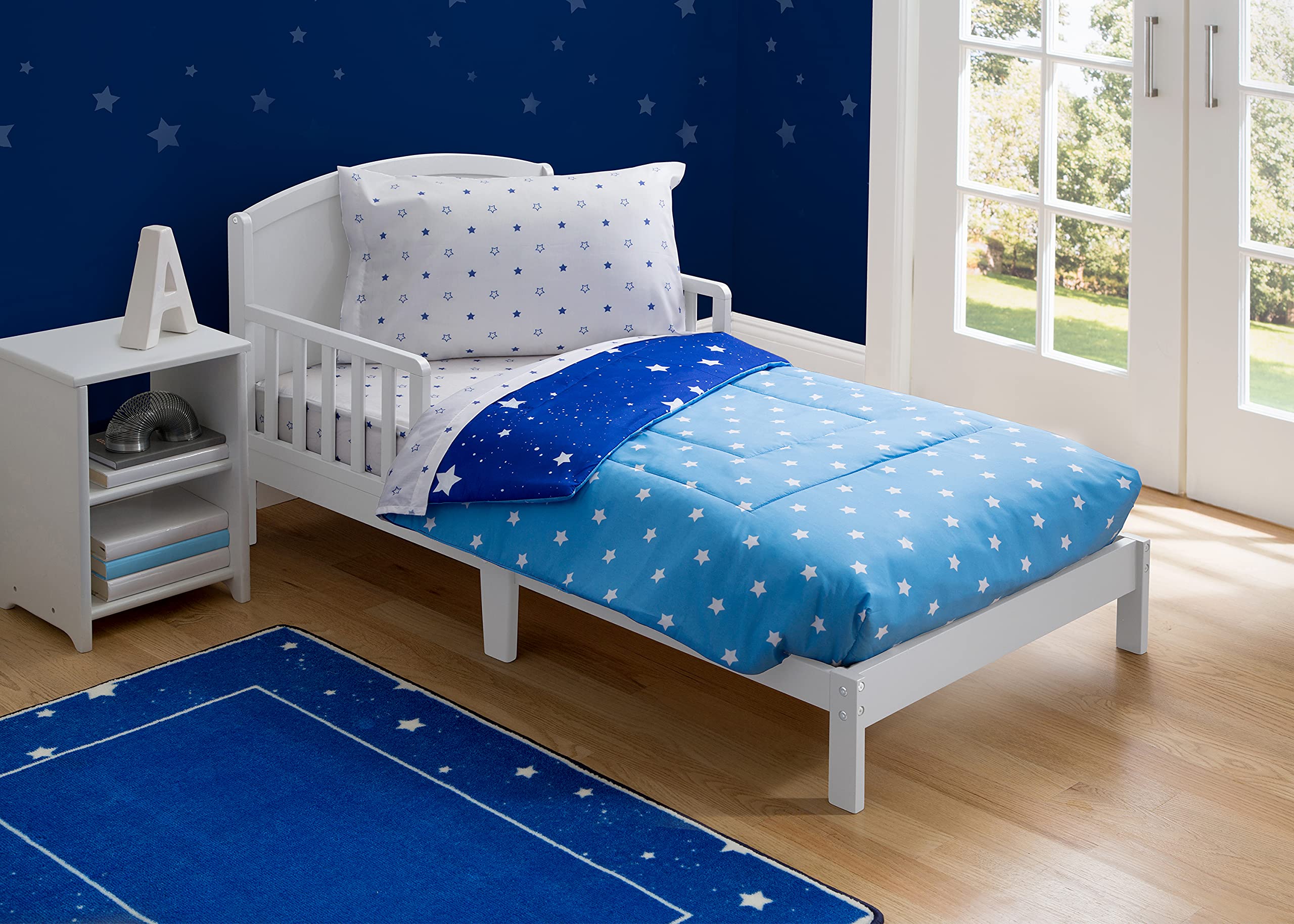 Delta Children 4 Piece Toddler Bedding Set for Boys - Reversible 2-in-1 Comforter - Includes Fitted Comforter to Keep Little Ones Snug, Bottom Sheet, Top Sheet, Pillow Case - Blue Stars