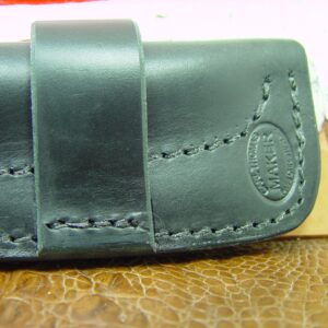 Custom Made Cross Draw Knife Sheath That Will fit The SOG Seal pup Dyed Black. A lot of Leather for The Price. Can be Worn on Left or The Right Hand Side.