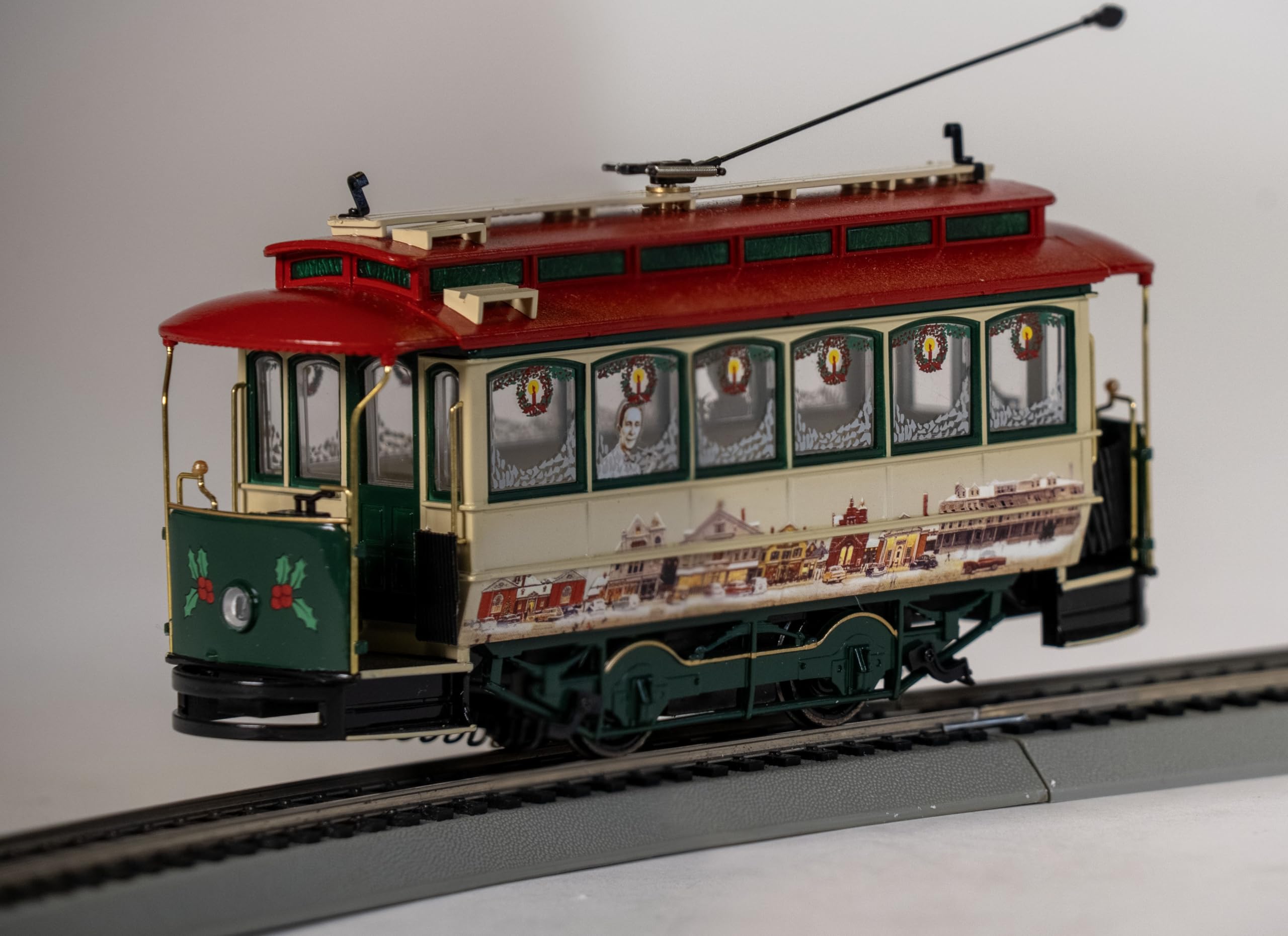 Bachmann Trains - Norman Rockwell's Main Street Christmas Battery Operated Auto Reversing Village Streetcar Set - On30 Scale - Runs on HO Track