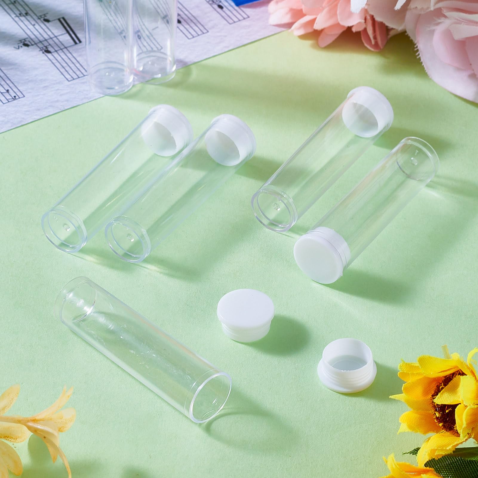 Craftdady 100Pcs Transparent Clear Plastic Small Empty Storage Tubes Bead Container Set Test Bottles Organizers Boxes with Lid 2.16x0.59 (55x15mm)