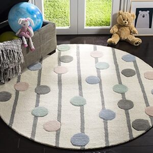 safavieh kids collection area rug - 5' round, ivory & multi, handmade polka dot stripe wool, ideal for high traffic areas in living room, bedroom (sfk909a)