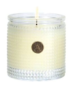 aromatique 5.5 oz candle in orange and evergreen