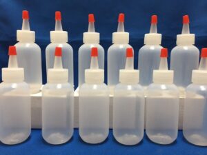 dimes 12 pack of 2oz (60ml) plastic boston round squeeze bottles with yorker caps ldpe