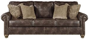 signature design by ashley nicorvo traditional faux leather sofa with gold nailhead trim, brown