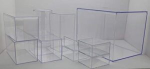 clear large rigid plastic box 12 1/2" x 8 1/2" x 8 1/2" with variety boxes inside (round 4 1/4" dia, 8" x 4" rectangle, and 4" x 4" square and others)