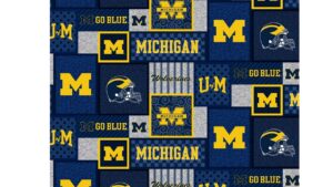 sykel enterprises university of michigan fleece blanket fabric with new patch design-sold by the yard