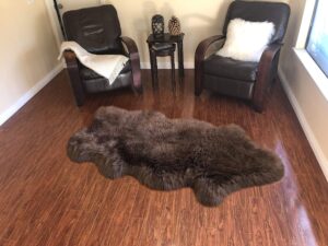 lambzy genuine sheepskin silky area rug - thick strong bottom texture easily washable stain resistant rug - perfect for children living room, bedroom decoration genuine 2'x 4'2', dark brown