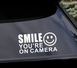 (2 pack) 7"x3.5" white - smile you're on camera - uv resistant, waterproof, peel & stick decor decal sticker quote adhesive vinyl mural art script lettering - for storefronts, cars, trucks, boats, etc