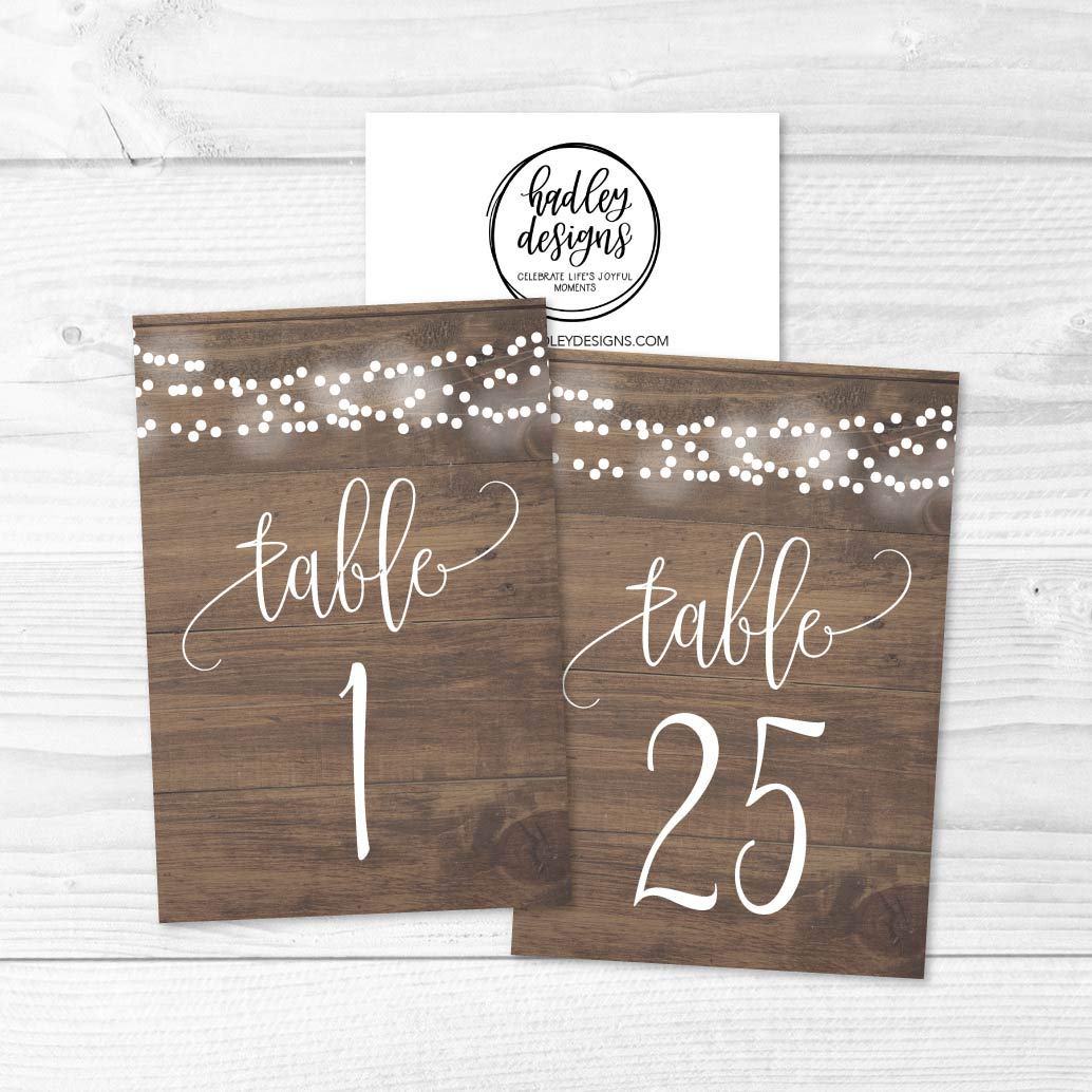 Hadley Designs 1-25 Rustic Wood Lights Table Number Double Sided Signs For Wedding Reception, Restaurant, Birthday Party Calligraphy Printed Numbered Card Centerpiece Reusable Frame Stand 4x6 Size