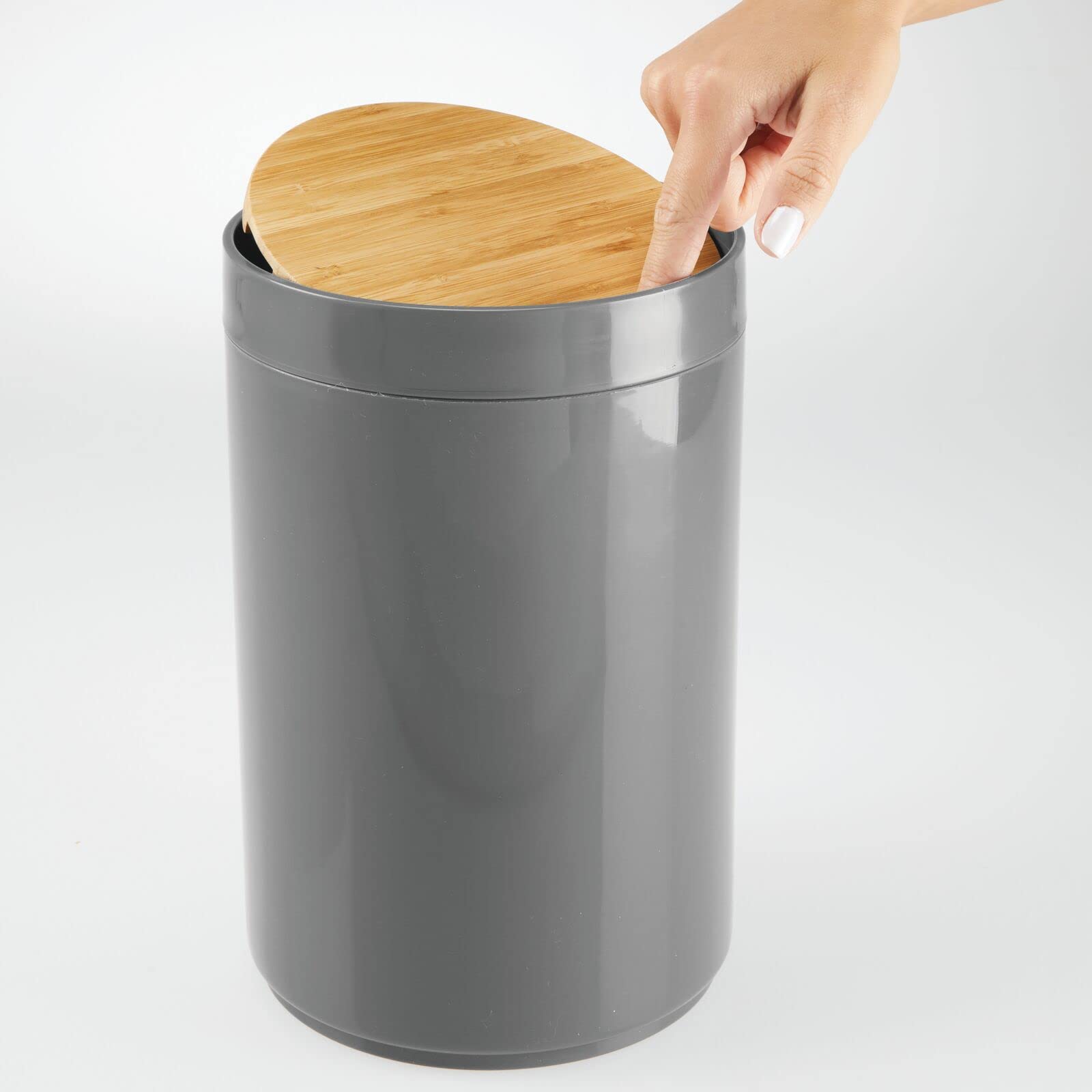 mDesign Plastic Round Trash Can Small Wastebasket - Garbage Bin Container with Swing-Close Lid - Bathroom Garbage Basket - Holds Waste, Recycling - 1.3 Gallon - Basa Collection - Charcoal Gray/Natural