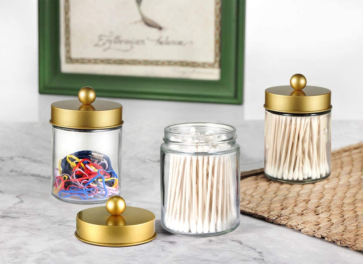 Amolliar Apothecary Jars Bathroom Storage Organizer -Countertop Storage Organizer Canister Jar - Cute Qtip Dispenser Holder Glass with Lid- for Cotton Swabs,Bath Salts,Hair Band / 2-Pack(Gold)