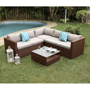 cosiest 4-piece outdoor furniture set all-weather brown wicker sectional sofa w warm gray thick cushions, glass coffee table, 2 teal pattern pillows