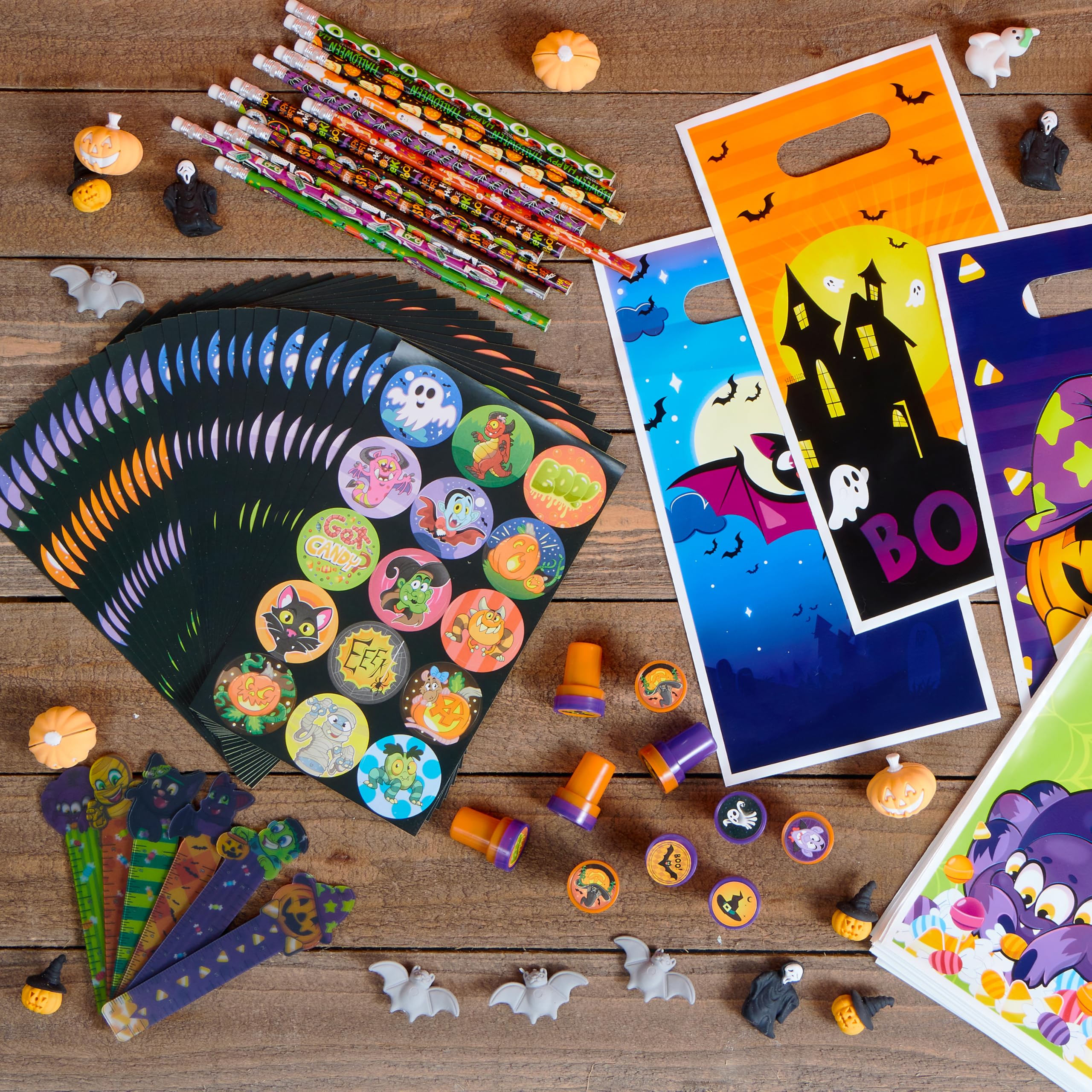 JOYIN 144 Pieces 24 Pack Assorted Halloween Themed Stationery Kids Gift Set Trick Treat Price Party Favor Toy Including Halloween Pencils, Rulers, Stickers, Stamps and Erasers in Trick or Treat Bags