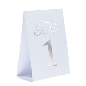 silver and white table number cards wedding reception