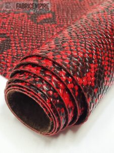 vinyl fabric embossed texture rattlesnake fake leather sold by the yard (ruby red)