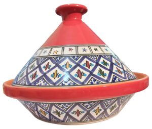 tagine hand made,painted ceramic by artist slama made for mago of carthage traditional design of the mediterranean island djerba.