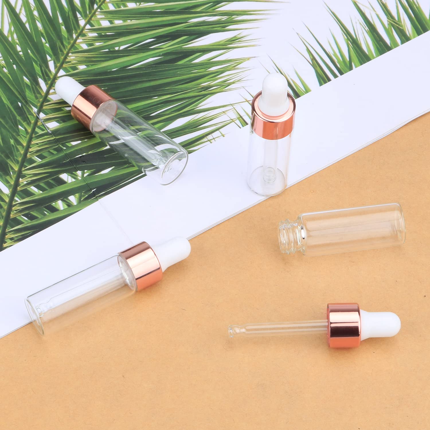 Clear Glass Dropper Bottles,50 Packs Essential Oils Bottles With Rose Gold Lids Perfume Sample Vials Travel DIY Cosmetic Liquid Containers 2 Pipettes Included (5ml(1/6oz))