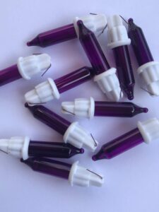 2.5 volt purple replacement mini light bulbs - 100 purple bulbs on white bases - christmas