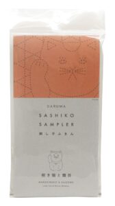 yokota daruma sashiko cloth sashiko fabric - pre-printed sashiko sampler - white with english instruction inside (navy manekineko)