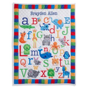 personalized planet primary color boy's abc quilt with custom name embroidered in blue thread on rectangular blanket with alphabet letters and cartoon animals, 31x40