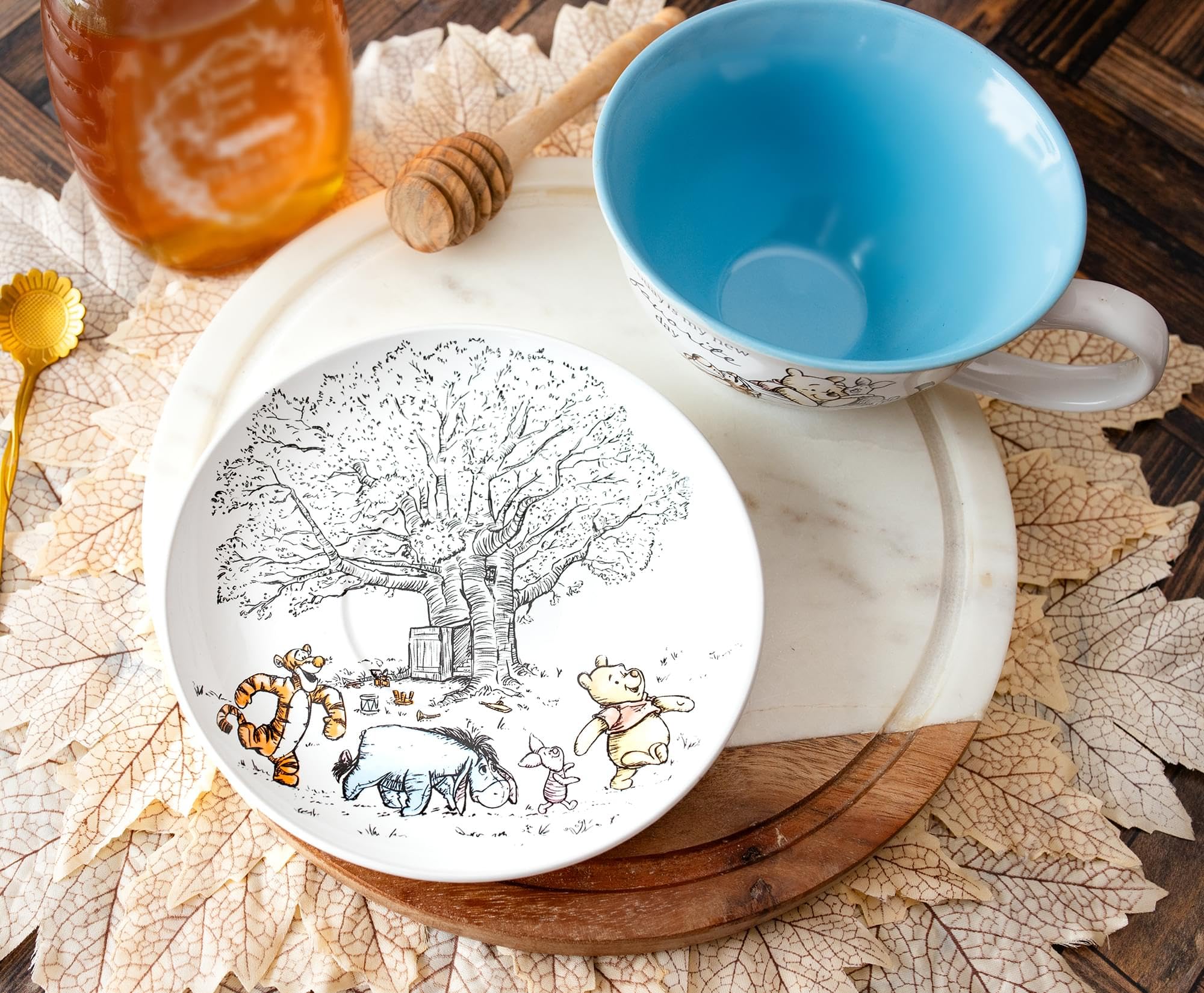 Silver Buffalo Disney Winnie the Pooh Walking Classic Scene Ceramic Teacup and Saucer, 12 Ounces