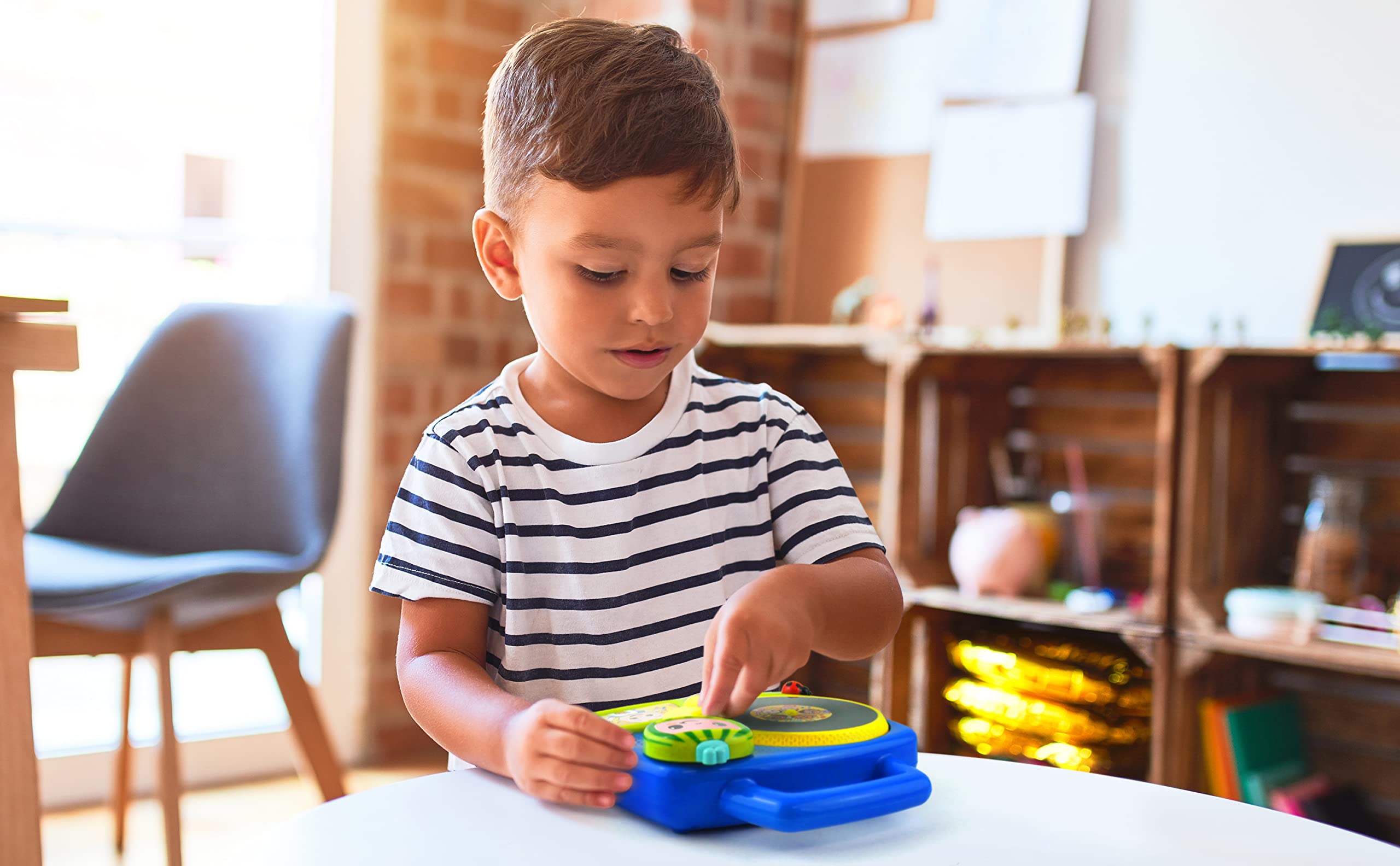 eKids Cocomelon Toy Turntable for Toddlers with Built-in Nursery Rhymes and Sound Effects for Fans of Cocomelon Toys