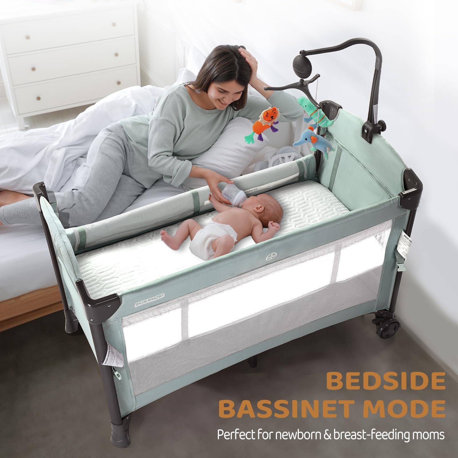 JOYMOR 3 in 1 Baby Bedside Bassinet, Bedside Sleeper with Mattress and Sheet, Convert to Bassinet, Playpen, Foldable Travel Bassinet Bed, with Toy, Wheels, Brake, Carry Bag