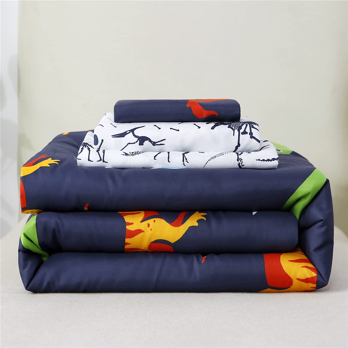 URBONUR 4-Piece Toddler Bedding Set - Ultra Soft Cartoon Jurassic Dinosaur Print Boys Toddler Comforter Set - Include Comforter, Flat Sheet, Fitted Sheet and Reversible Pillowcase, Navy Dinosaur