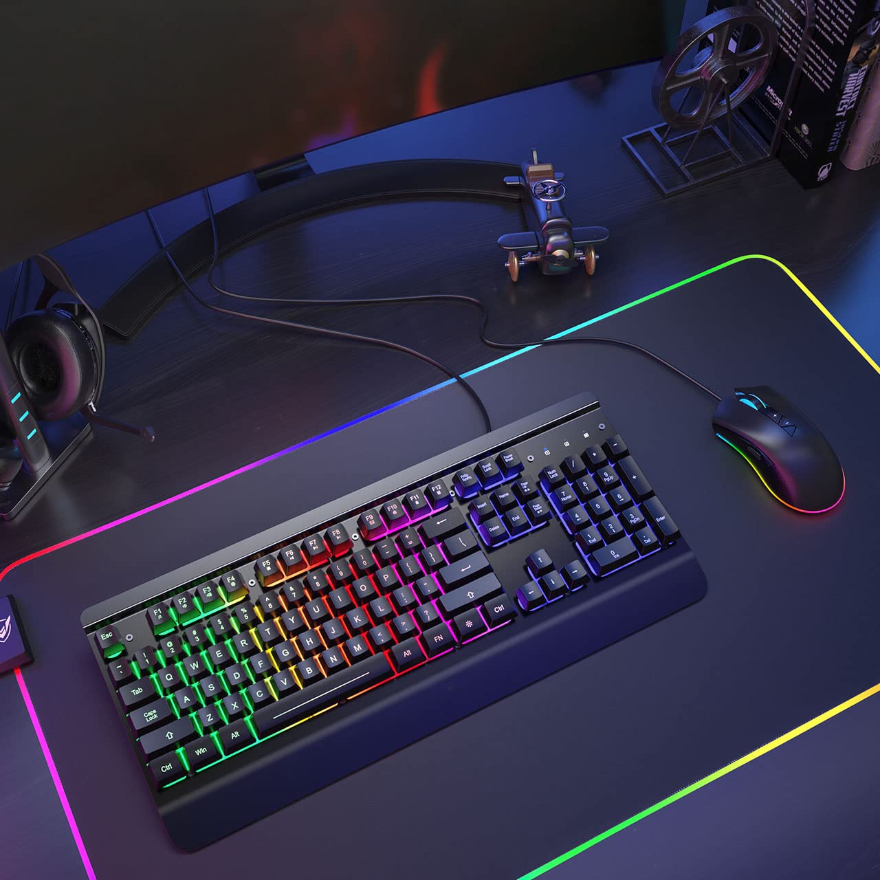 Pauroty Gaming Keyboard Metal, Rainbow LED Backlit Silent Keyboard with Wrist Rest, 104 Quiet Membrane Keys, Multimedia Keys,19 Anti-ghosting Keys, Waterproof, USB Wired Keyboard for Windows PC Gamer