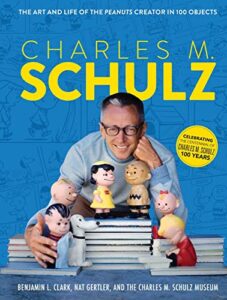 charles m. schulz: the art and life of the peanuts creator in 100 objects (peanuts comics, comic strips, charlie brown, snoopy)