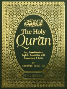 the holy qur'an- arabic and english text, along with romanised text for pronouncing the arabic, along with commentaries and notes to give depth of understanding