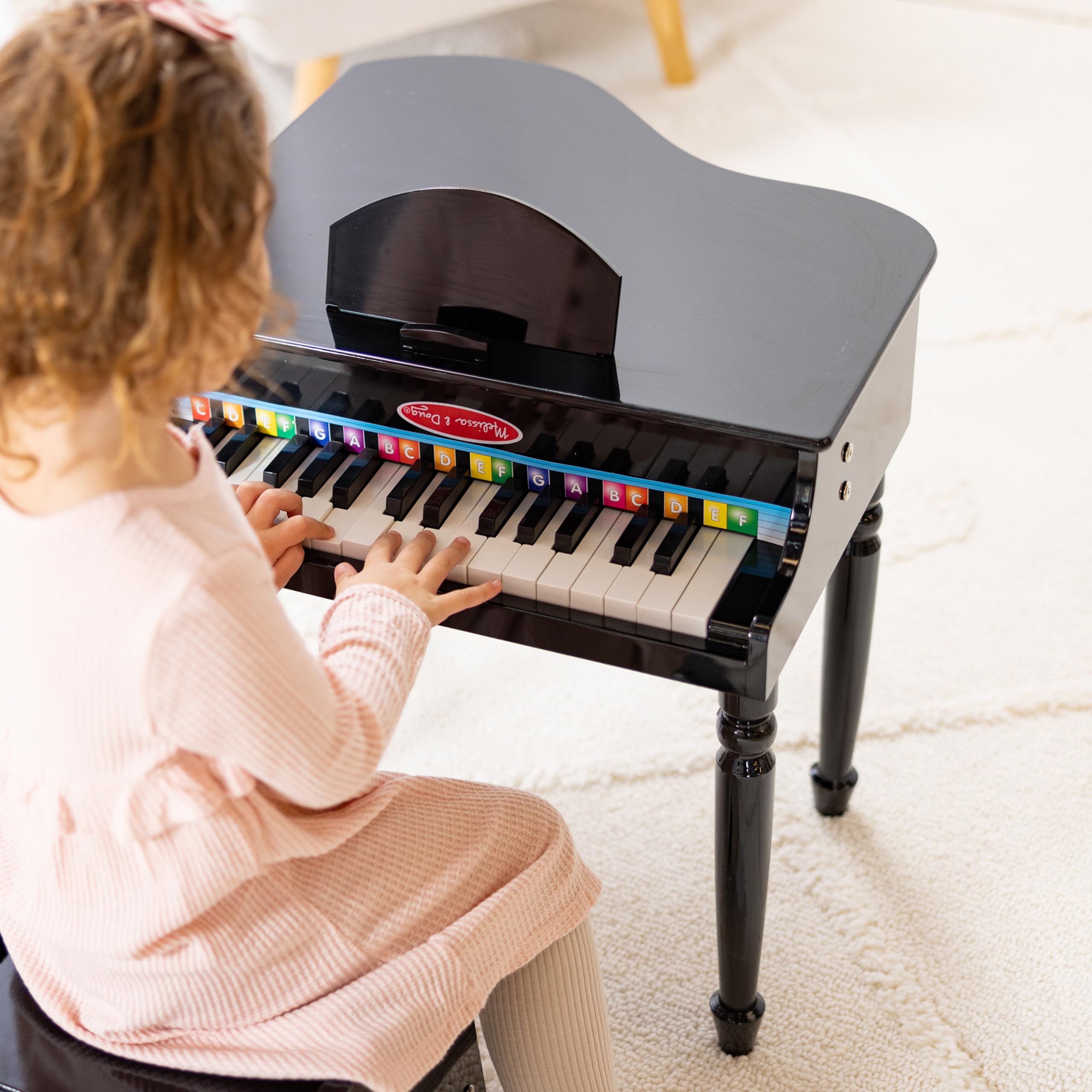 Melissa & Doug Learn-To-Play Classic Grand Piano With 30 Keys, Color-Coded Songbook, and Non-Tip Bench 23.5" x 22.2" x 10"