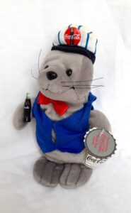 coca cola seal in delivery outfit