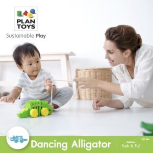 PlanToys Dancing Alligator Push & Pull Toy - Sustainably Made from Rubberwood with 3 Organic-Pigment Color Options and Makes Click-Clack Sounds and Dancing Movements when Pulled (Natural)