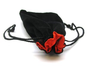 5"x8" black velvet dice bag with red satin lining