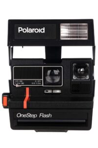 vintage polaroid one step flash camera