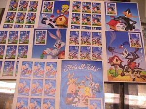 looney tunes u.s. postage stamps set of 5 bugs bunny, daffy duck,sylvester & tweety, roadrunner & wile e. coyote, porky pig