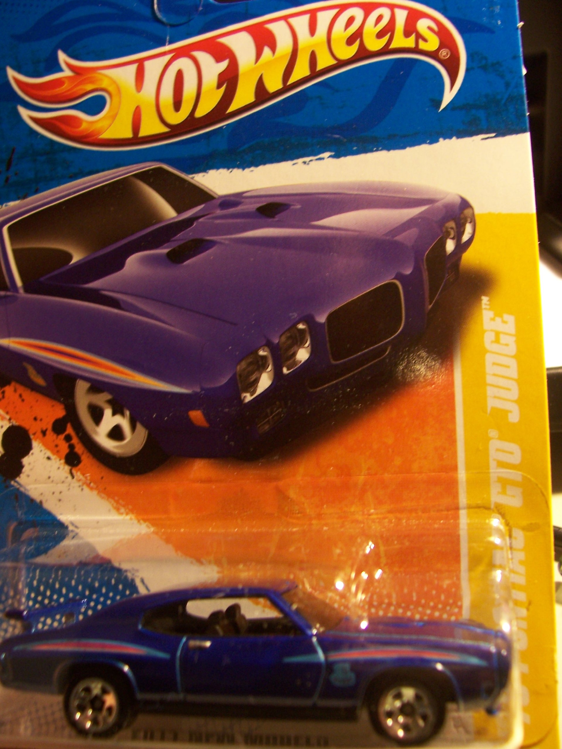 Hot Wheels 2011 '' '70 Pontiac GTO Judge HW Premiere '11 -11 of 50 - 11/244 Deep Blue with 'The Judge' Decal on Front quarterpanel. Has Spoiler on Trunk Lid