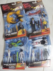 hot wheels speed racer action figure 2 packs. the four included speed racer two packs are rollin thunder, battle board, rockin rocketbike, kart cannon. includes speed racer (3), pops, spridle, chim