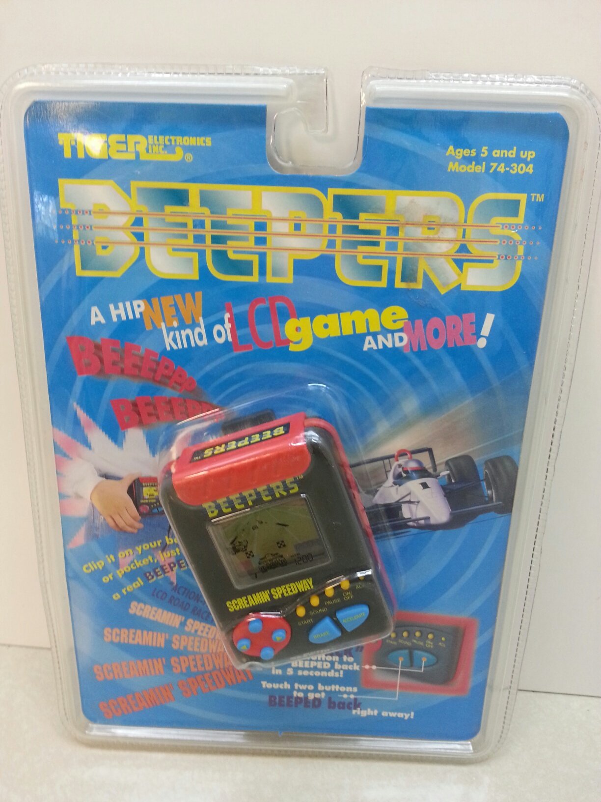 1995 Tiger Electronics, Inc. Tiger Electronics Beepers Screamin' Speedway Pager-like LCD Handheld-Held