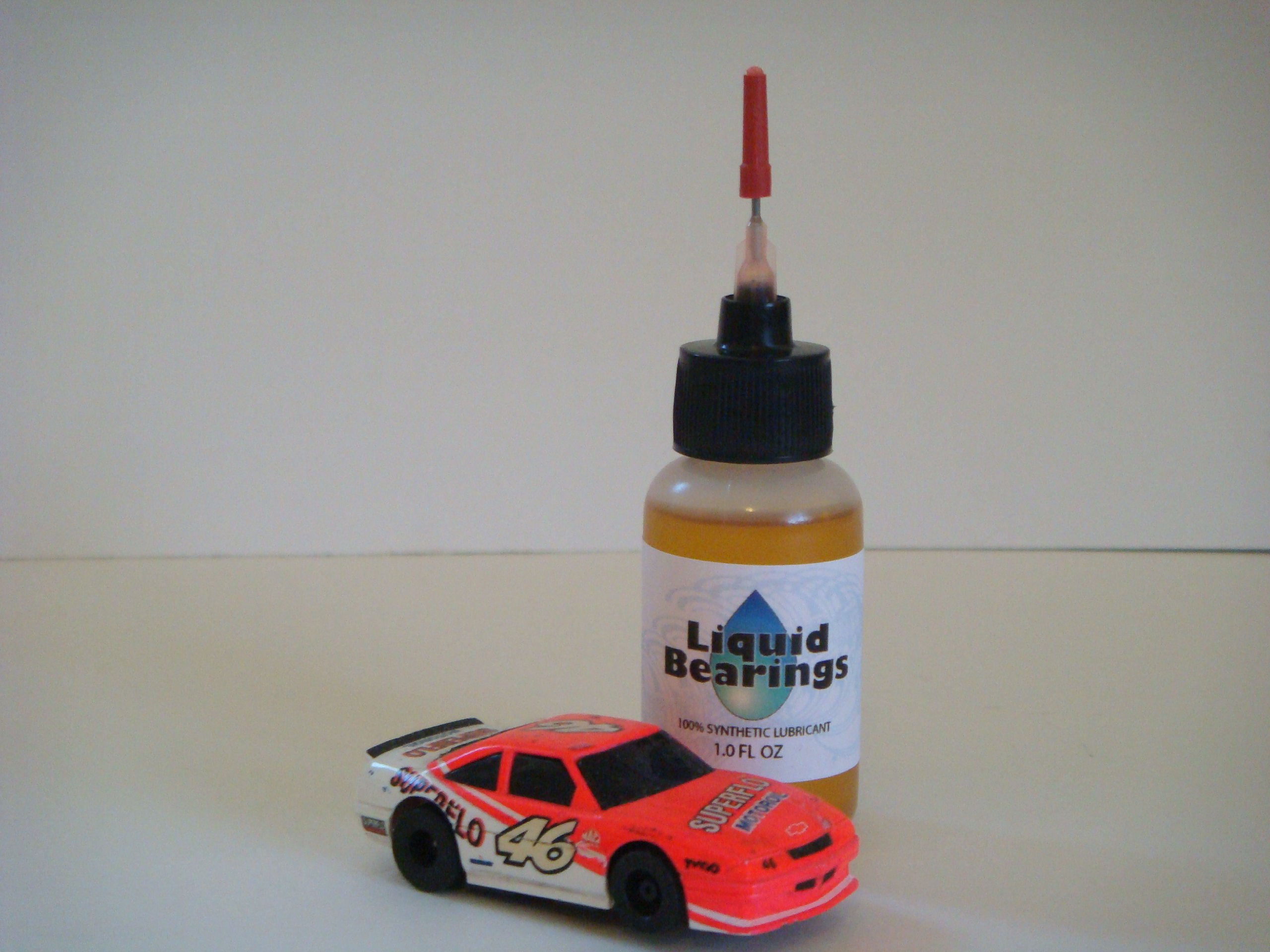 Liquid Bearings, The Ultimate 100%-Synthetic Oil for Slot Cars, Makes Cars Faster!!