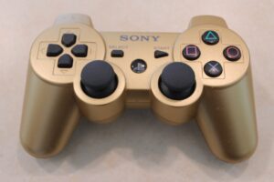 playstation 3 dualshock 3 wireless controller - metallic gold