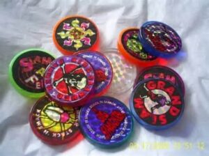 set of 8 assorted style and type pog / milkcap / game slammers