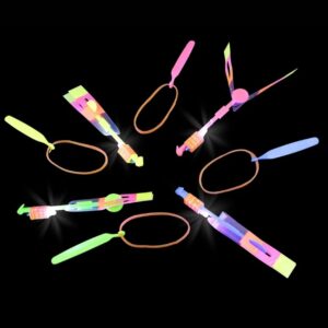 Dozen Light Up LED Slingshot Style Flying Helicopter Toy