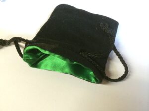 koplow games 3.75"x4" black velvet bag with green lining